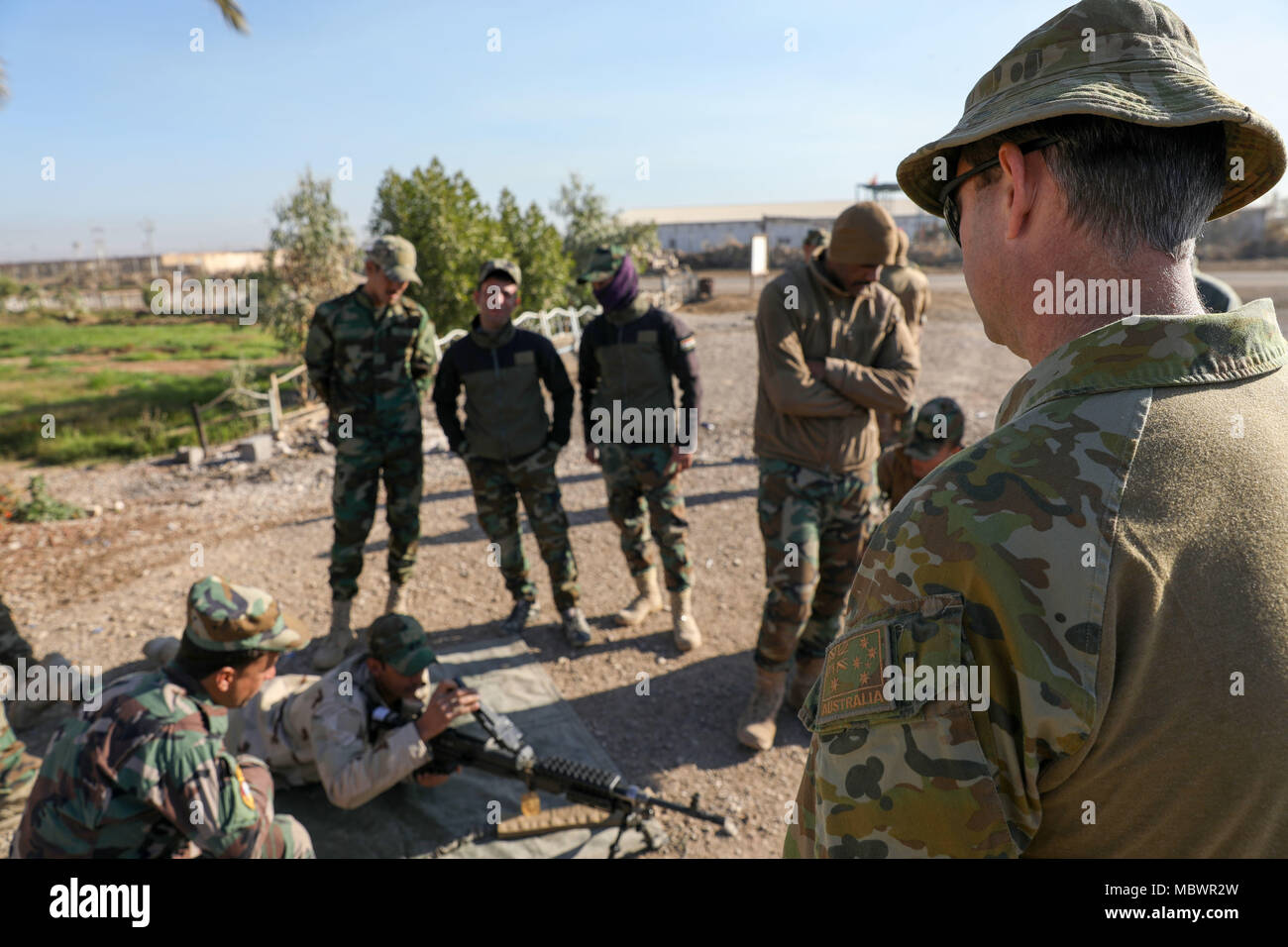 Australian Army Sgt. Jamie Tollan oversees an Iraqi Special Forces ...
