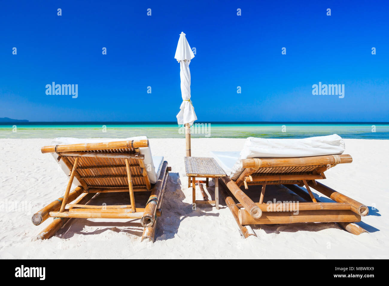 Beach beds on the beauty lonely beach Stock Photo - Alamy