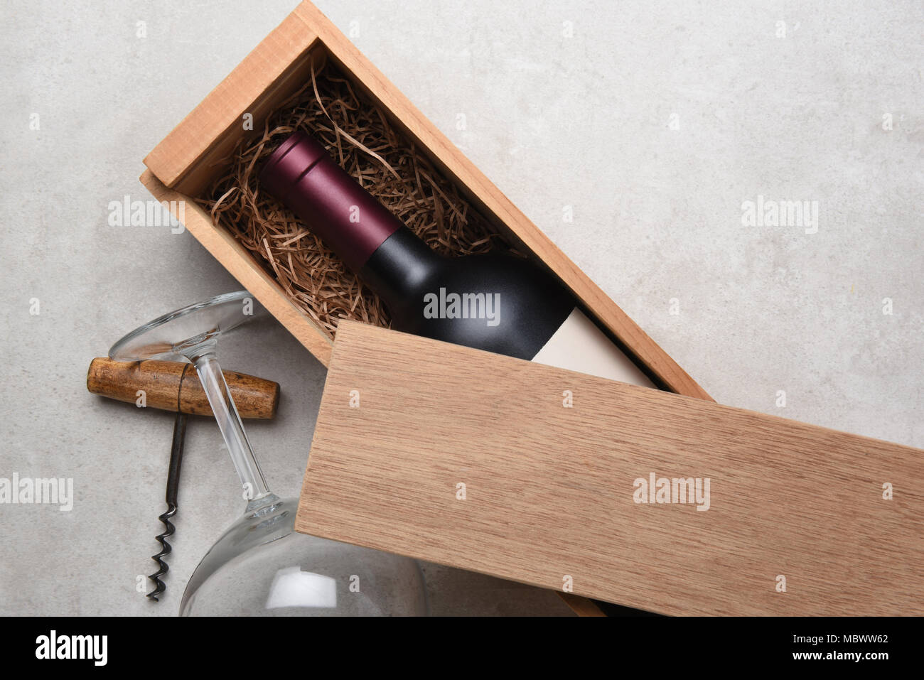 Cabernet Wine Box: A Red wine bottle in a wood box partially covered by ...