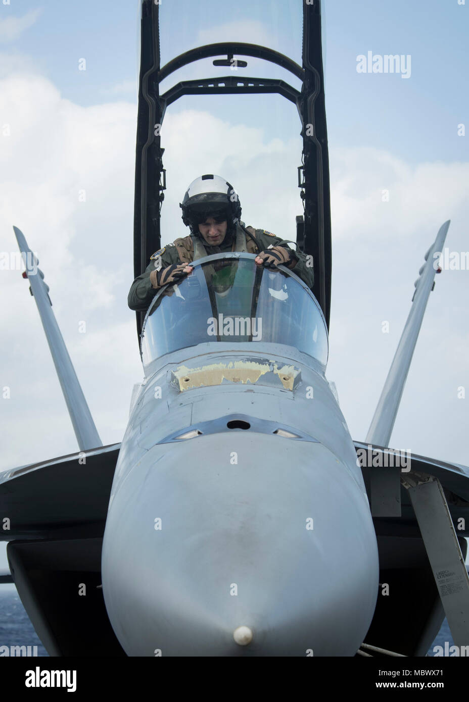 U.S. Navy Lt. John Bauman, of Columbus, Ohio, assigned to the Black ...