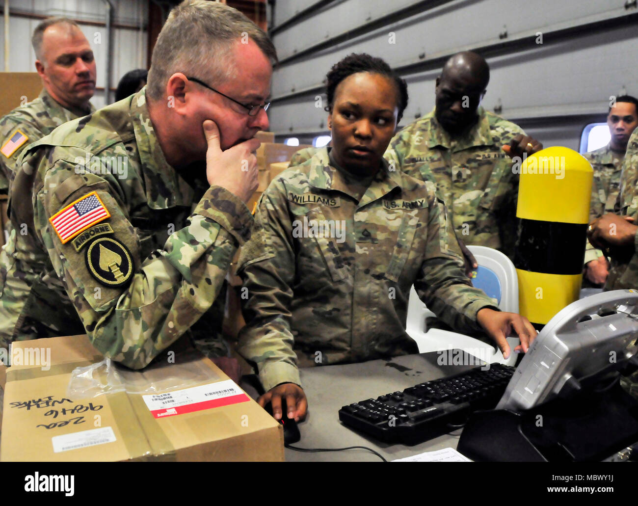 Pfc. Marissia Williams (right), of the 543rd Composite Supply Company's ...