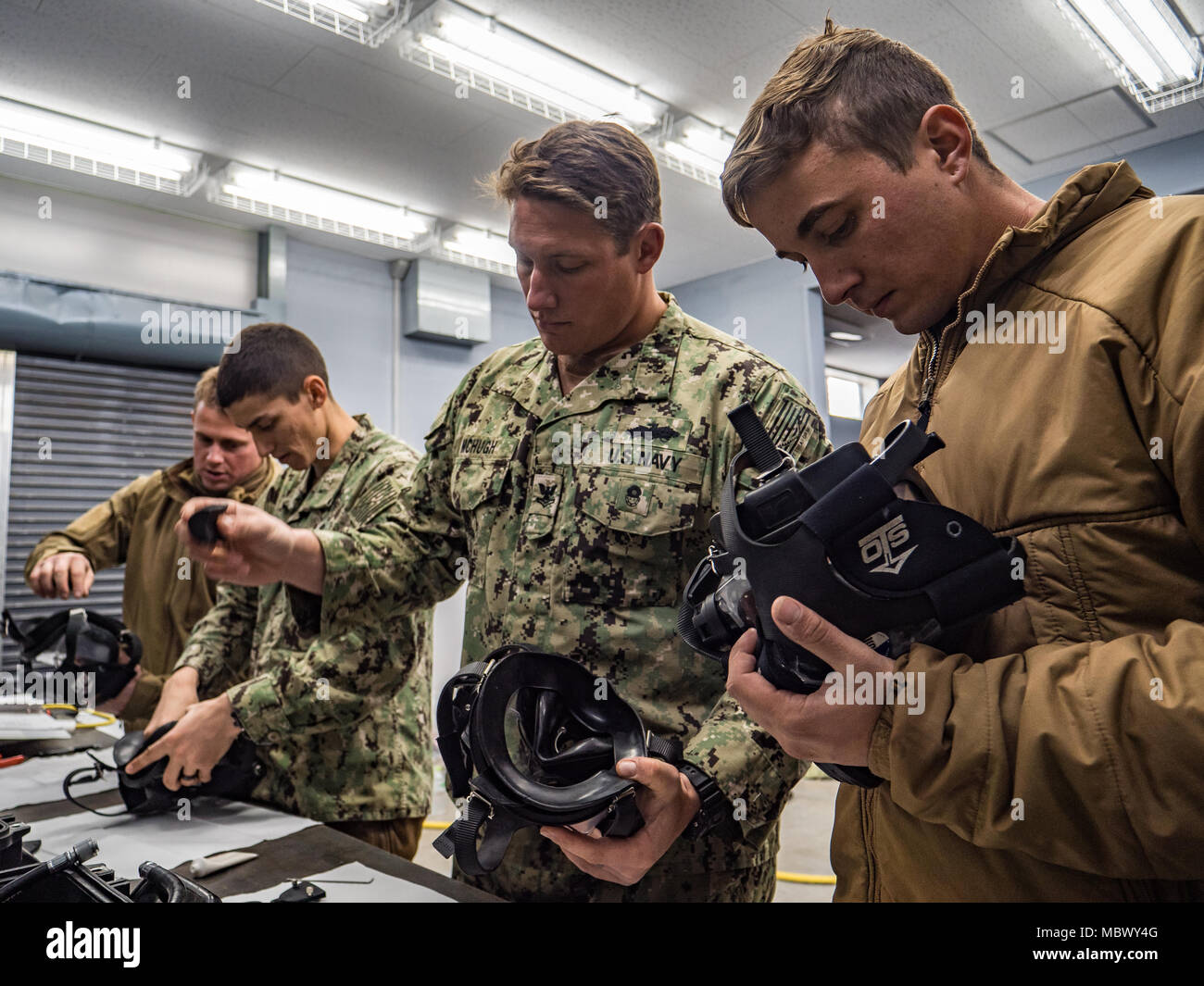 U.S. Navy Seabees, assigned to Underwater Construction Team (UCT) 2 ...