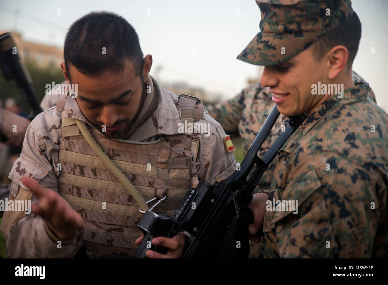 A Spanish Marine briefs a U.S. Marine with Special Purpose Marine Air ...