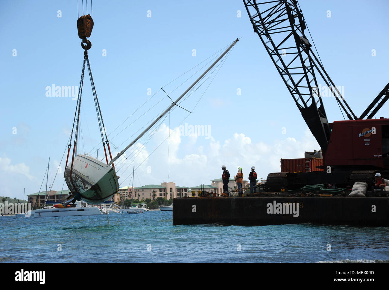 Coast Guard members oversee the operations of Resolve Marine Group, a ...