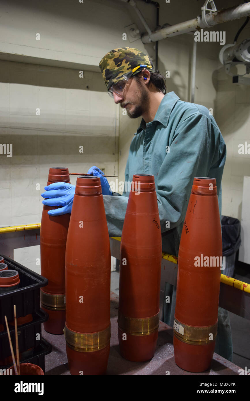Crane Army employees manufacture rounds for the MK 45 five-inch gun ...