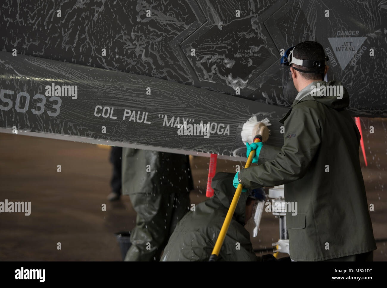 U.S. Air Force Col. Paul D. Moga, 33rd Fighter Wing commander, cleans ...