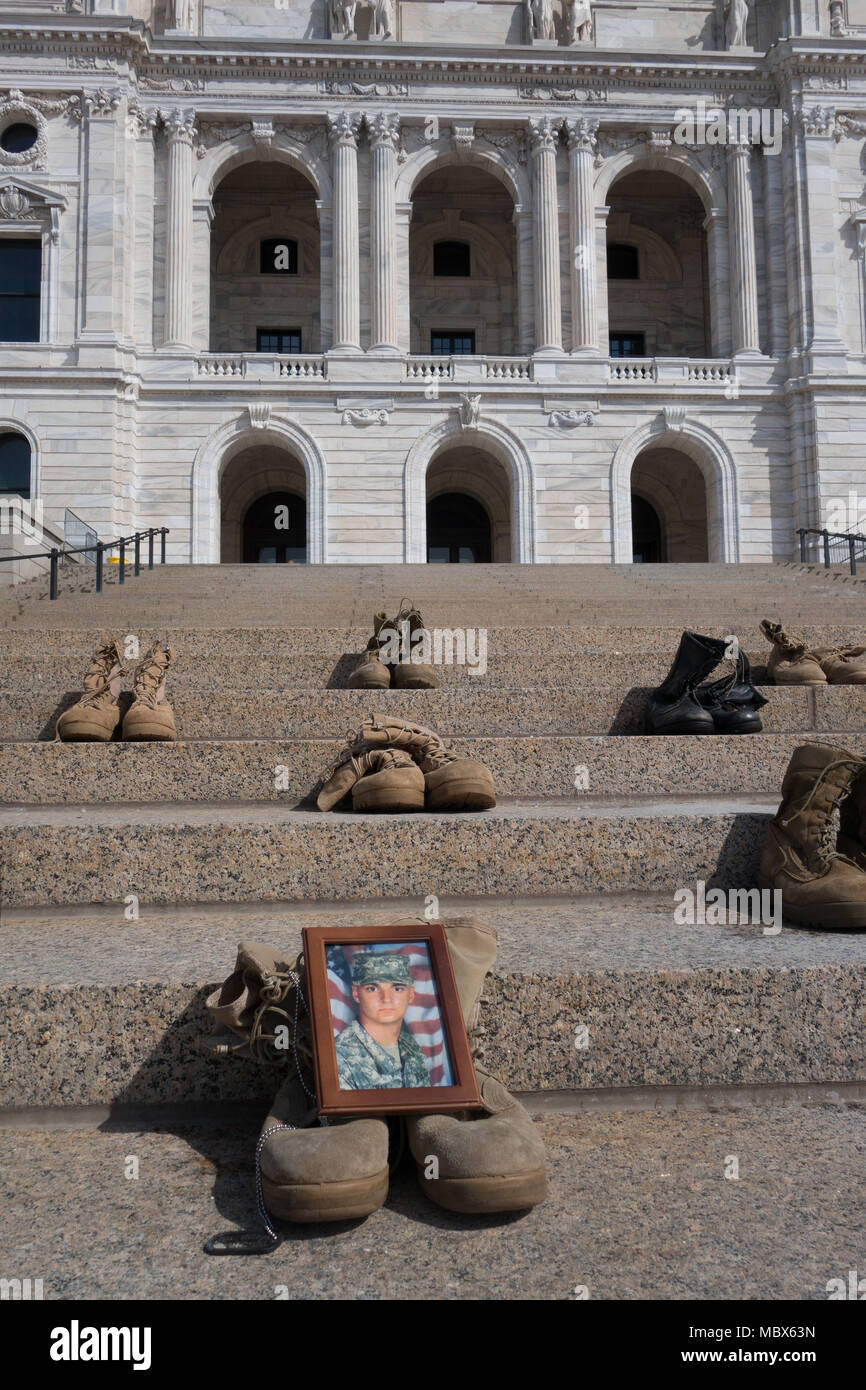 St. Paul, Minnesota, USA. 11th April, 2018. Military boots line the ...