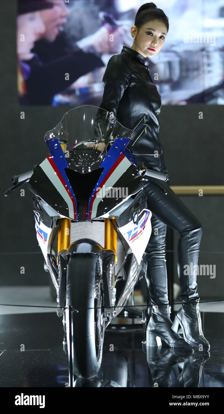 12th Apr, 2018. Motorcycle show in Seoul A model shows off BMW's new ...