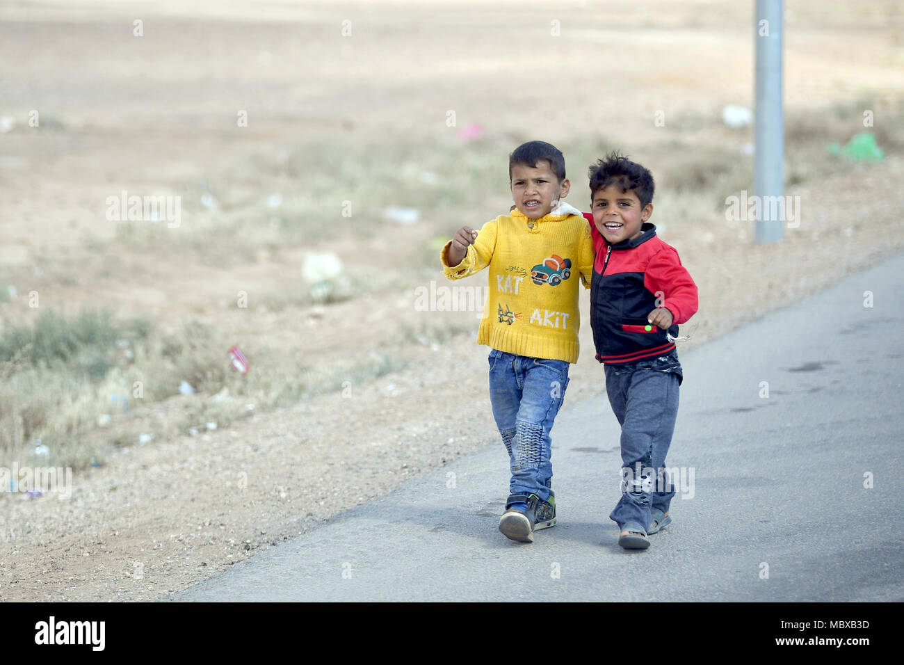 Refugee camp jordan children play hi-res stock photography and images ...