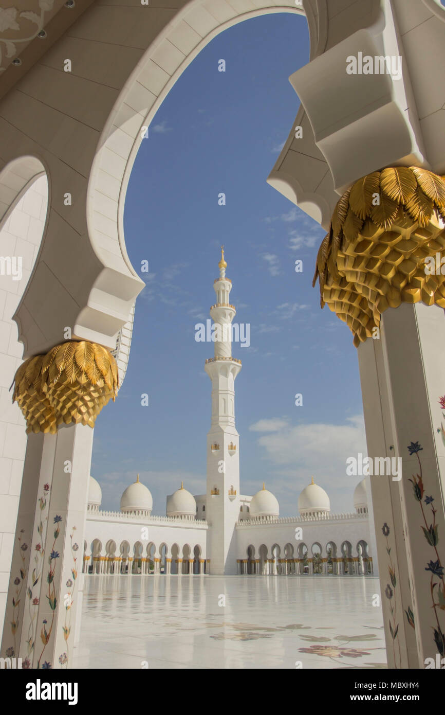 View through the arch to the tower of the Sheikh Zayed mosque. Abu ...