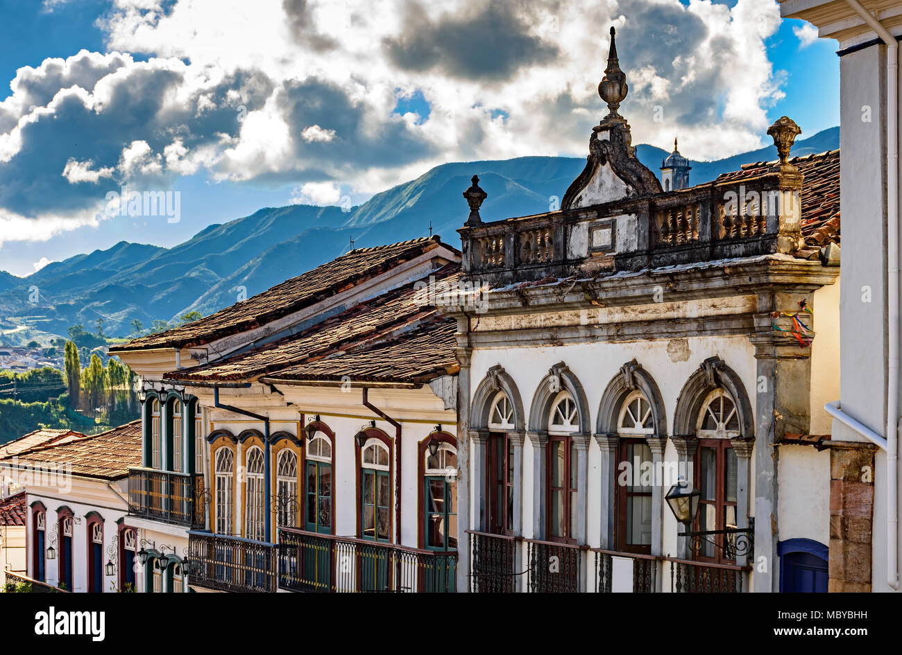 Facade of old houses built in colonial architecture with their ...