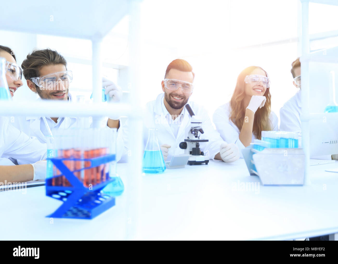 background image is a group of scientists microbiologists Stock Photo ...