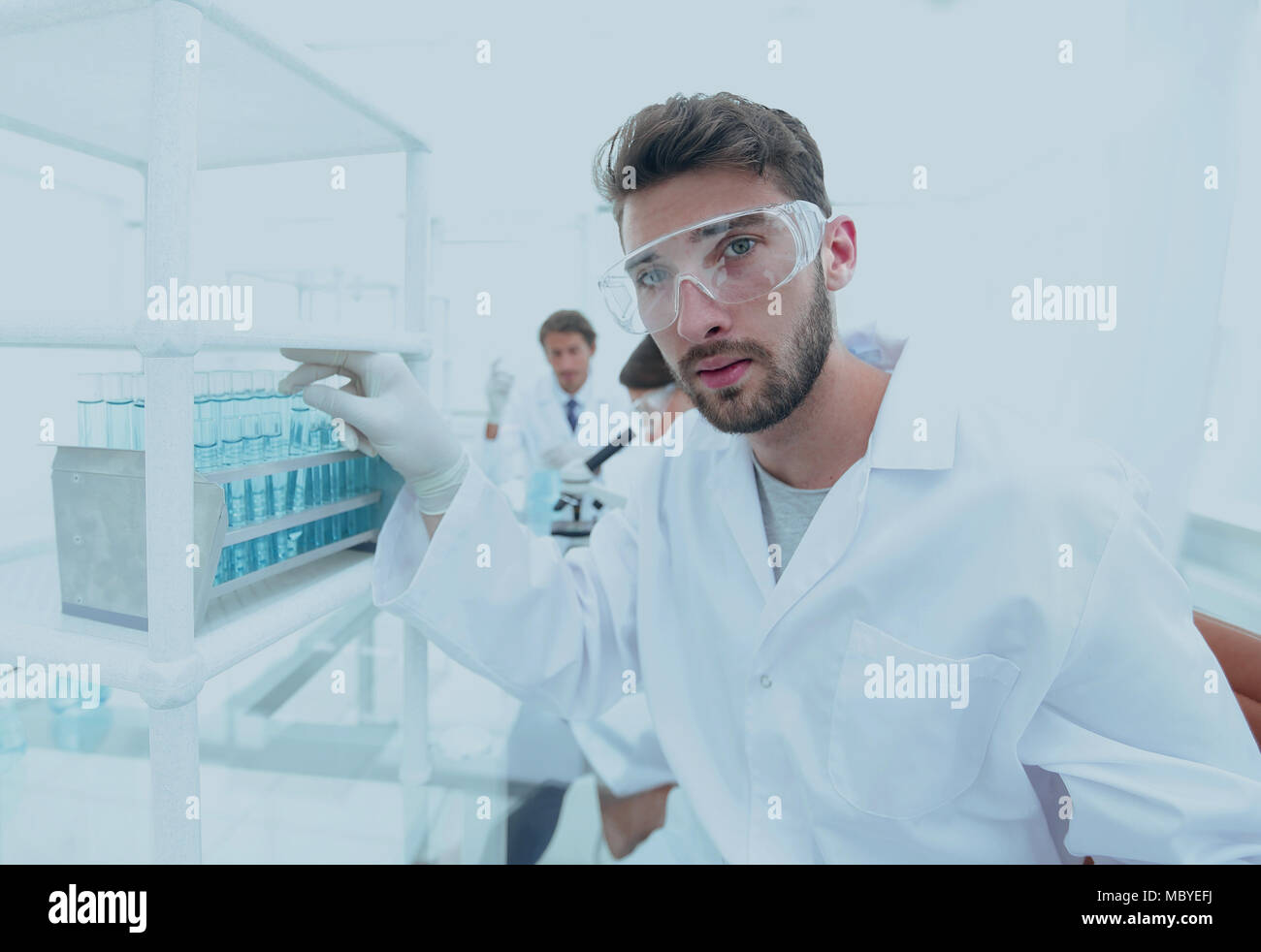 Side view concentrated scientists hi-res stock photography and images ...