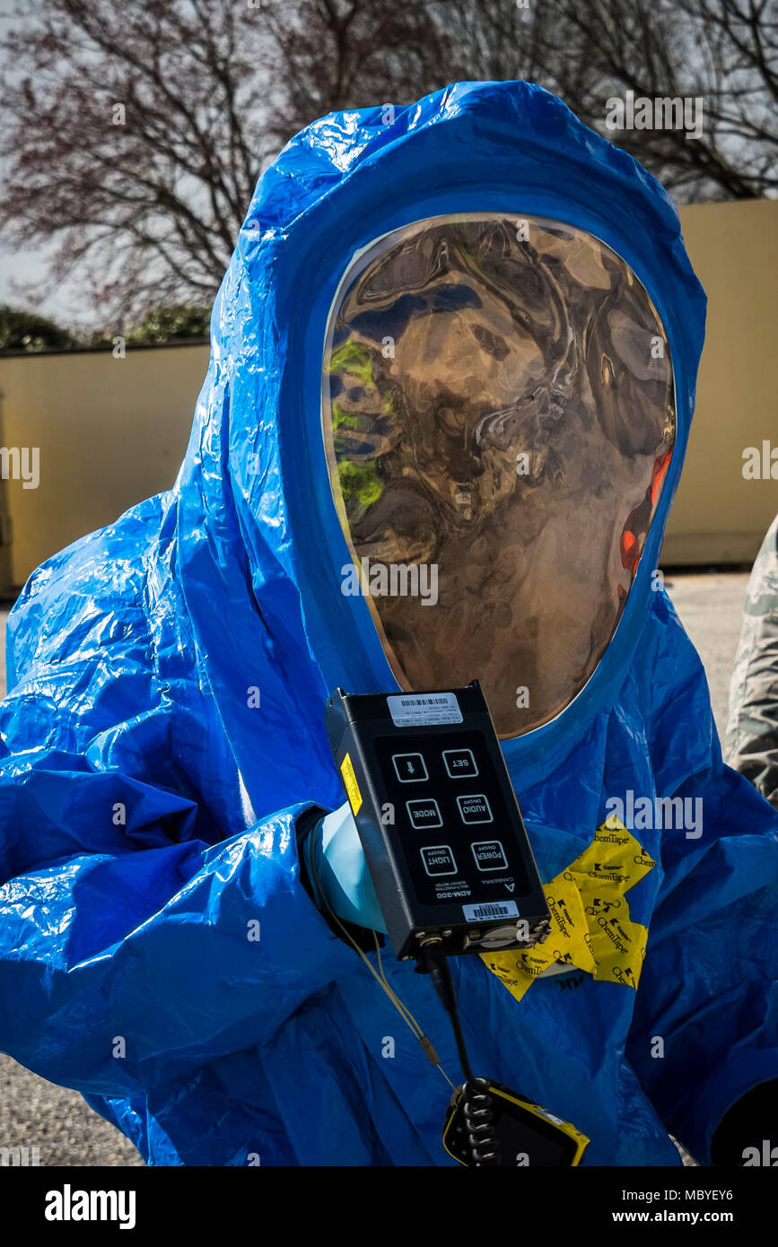 A Hazardous Materials specialist simulates using a Canberra ADM-300A ...
