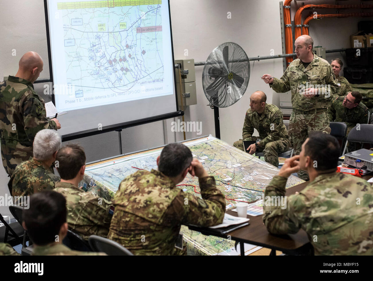 A multinational team deconflicts targeting priorities during a daily ...