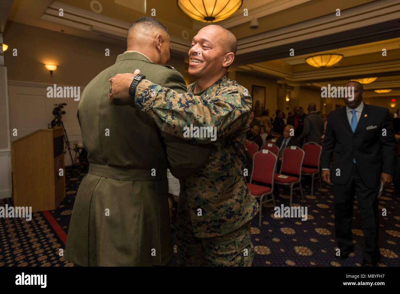 Attendees of U.S. Marine Corps Col. Ronald Jones, chief of behavioral ...