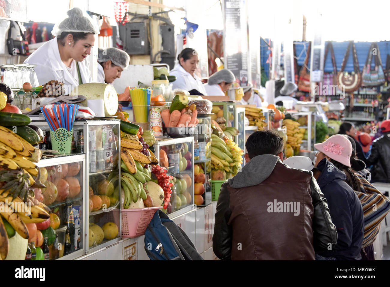 CUZCO, PERU - March 29, 2018: Fruit juice stalls in Mercado San Pedro ...