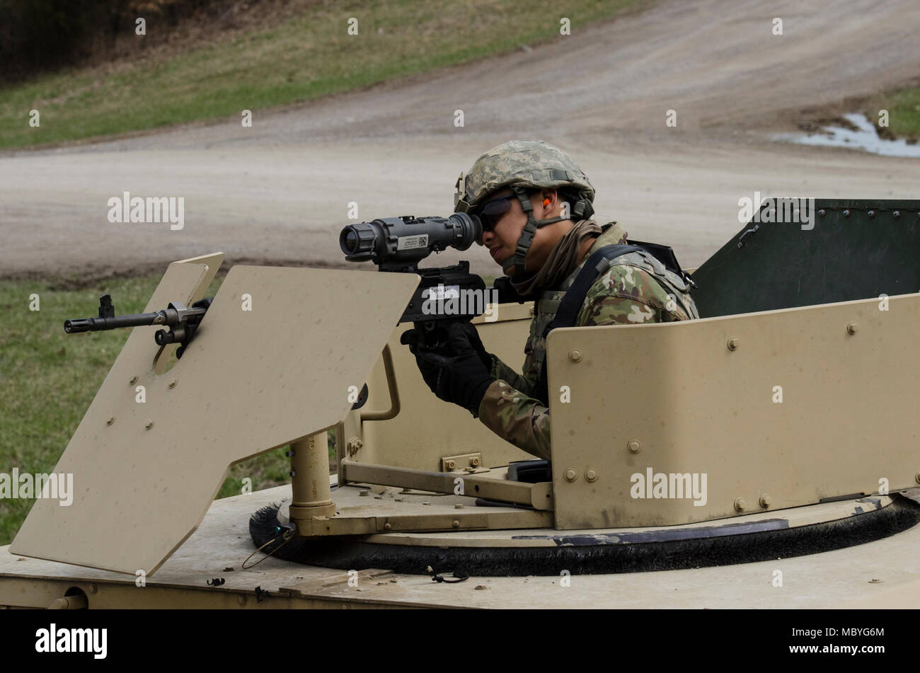 A U.S. Army Reserve Troop List Unit Soldier tests a thermal weapon ...