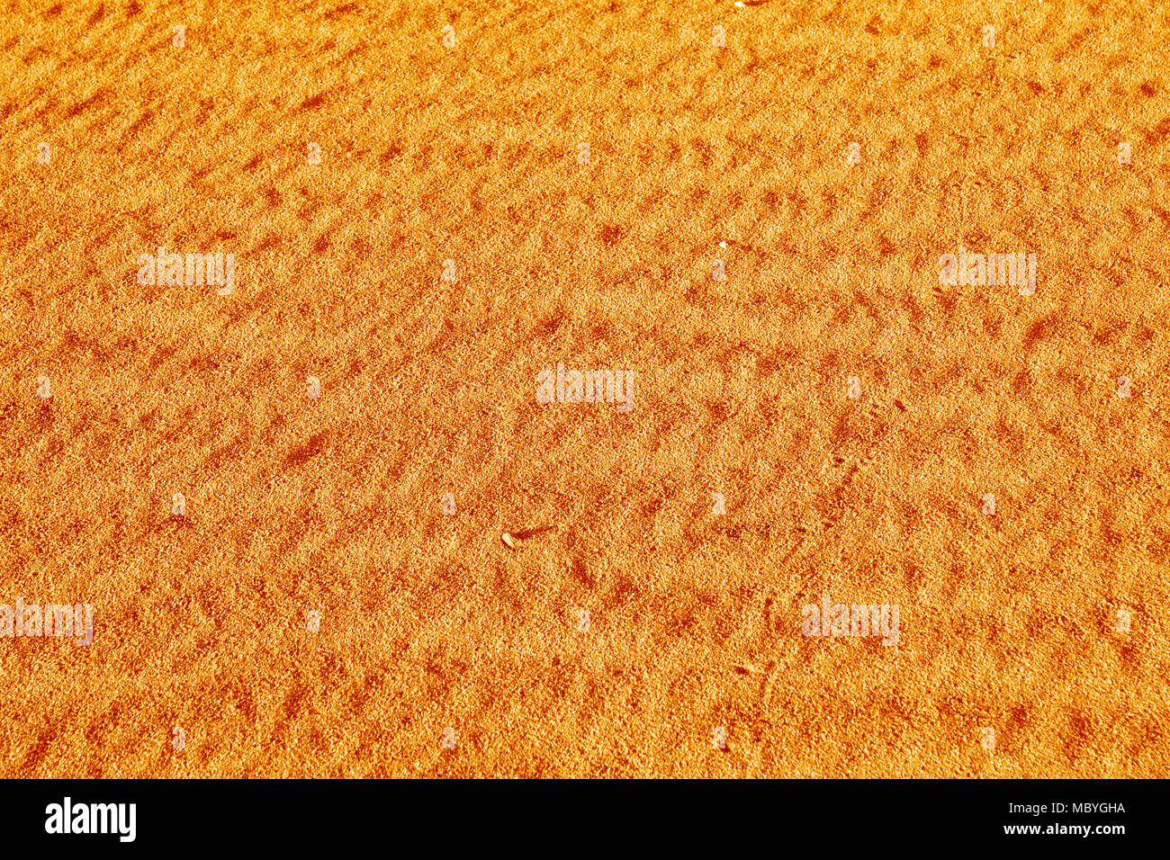 The natural texture from pure orange sand. Background Stock Photo - Alamy