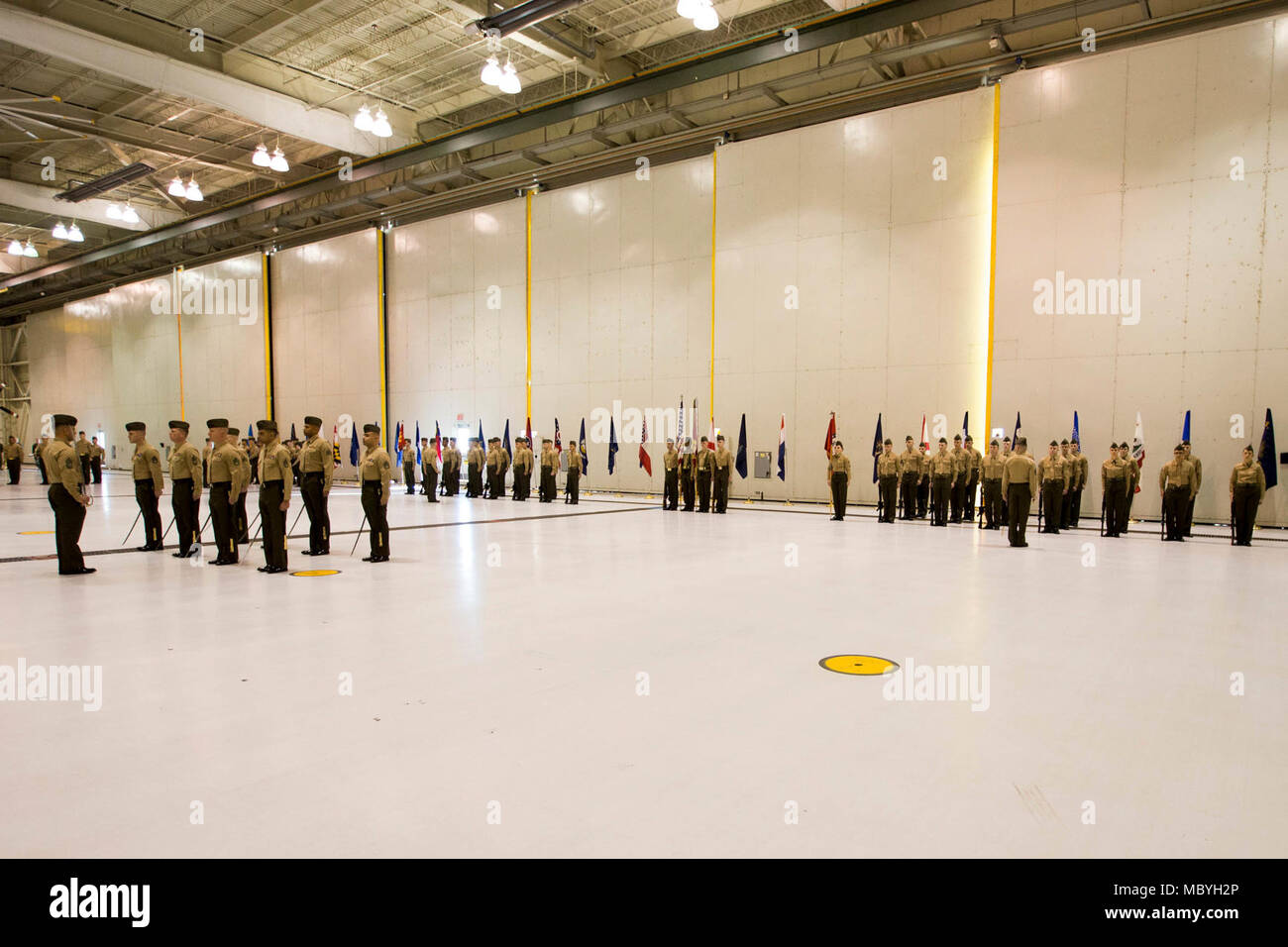 U.S. Marines with Marine Helicopter Squadron One (HMX-1) stand in ...