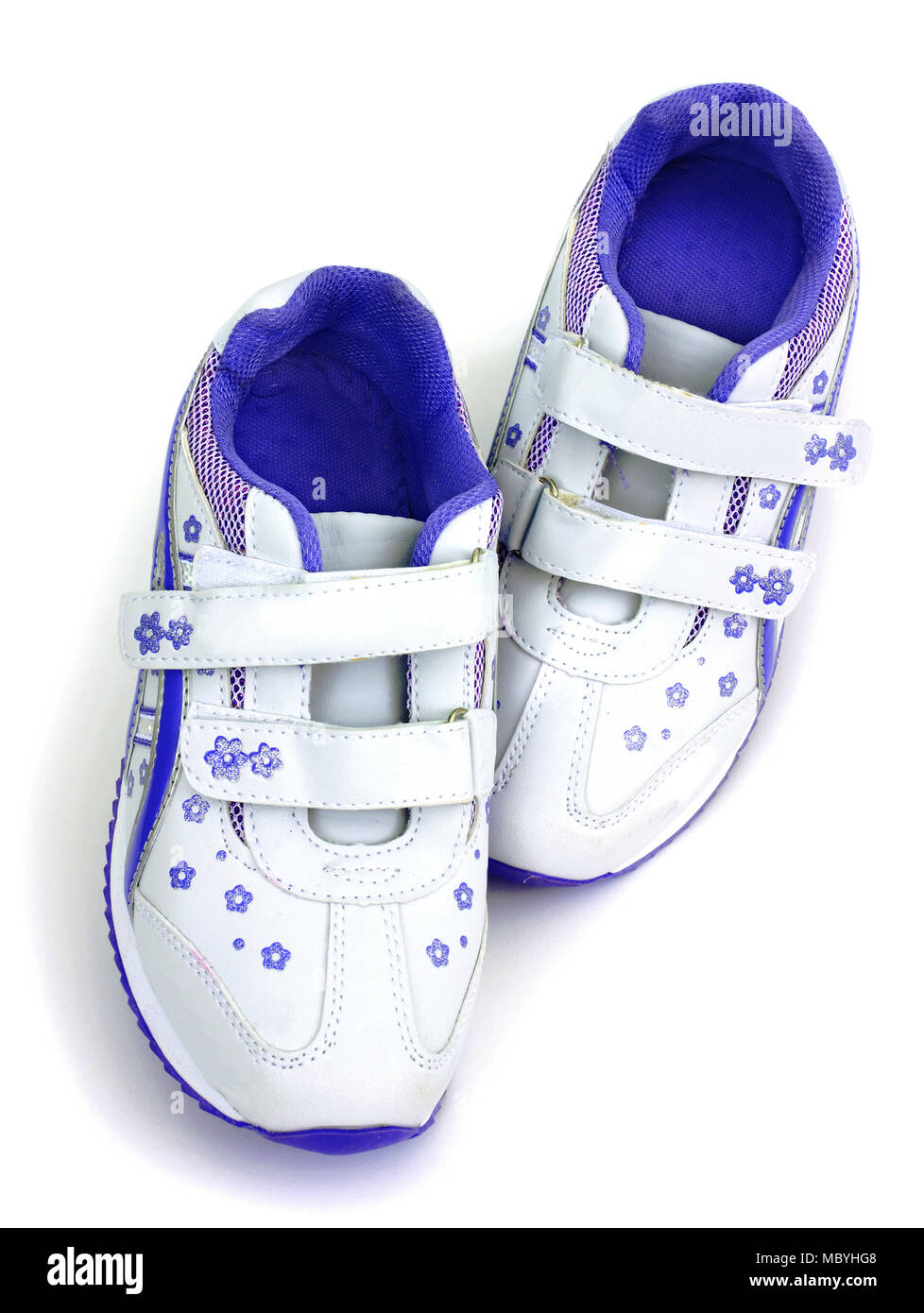 Pair of children's shoes on a white background Stock Photo - Alamy