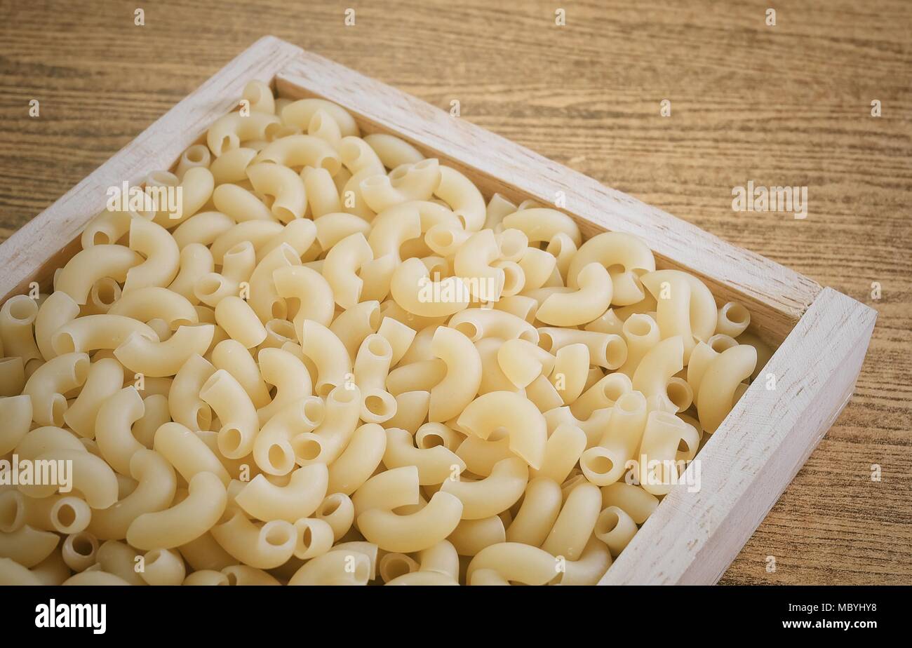 Food and Cuisine, Uncooked and Dried Elbow Macaroni or Gomiti Pasta in ...