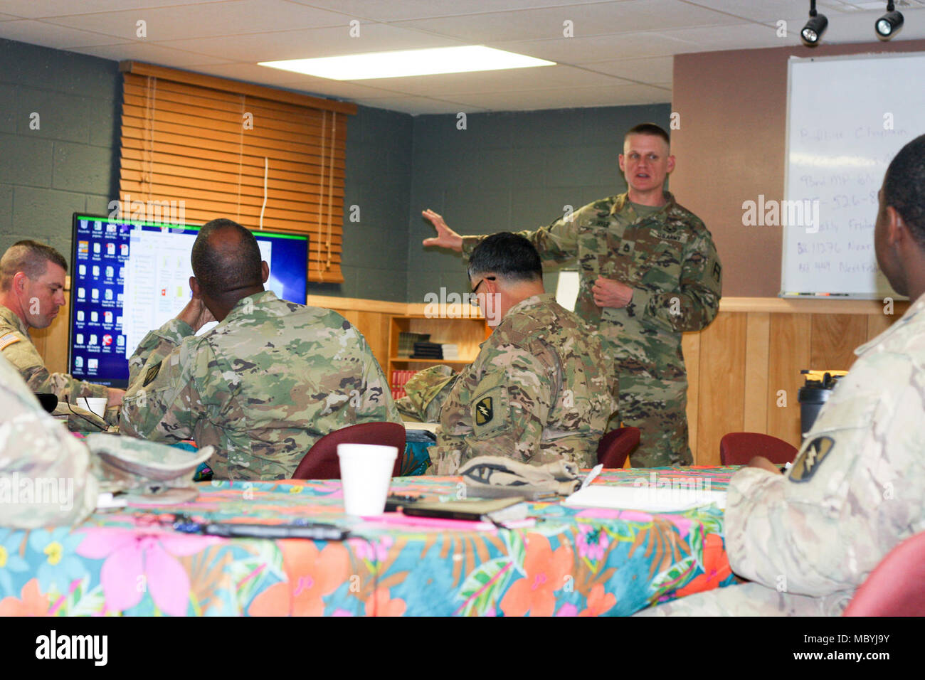 U.S. Army Sgt. First Class Michael Hyer, and observer-coach/trainer ...