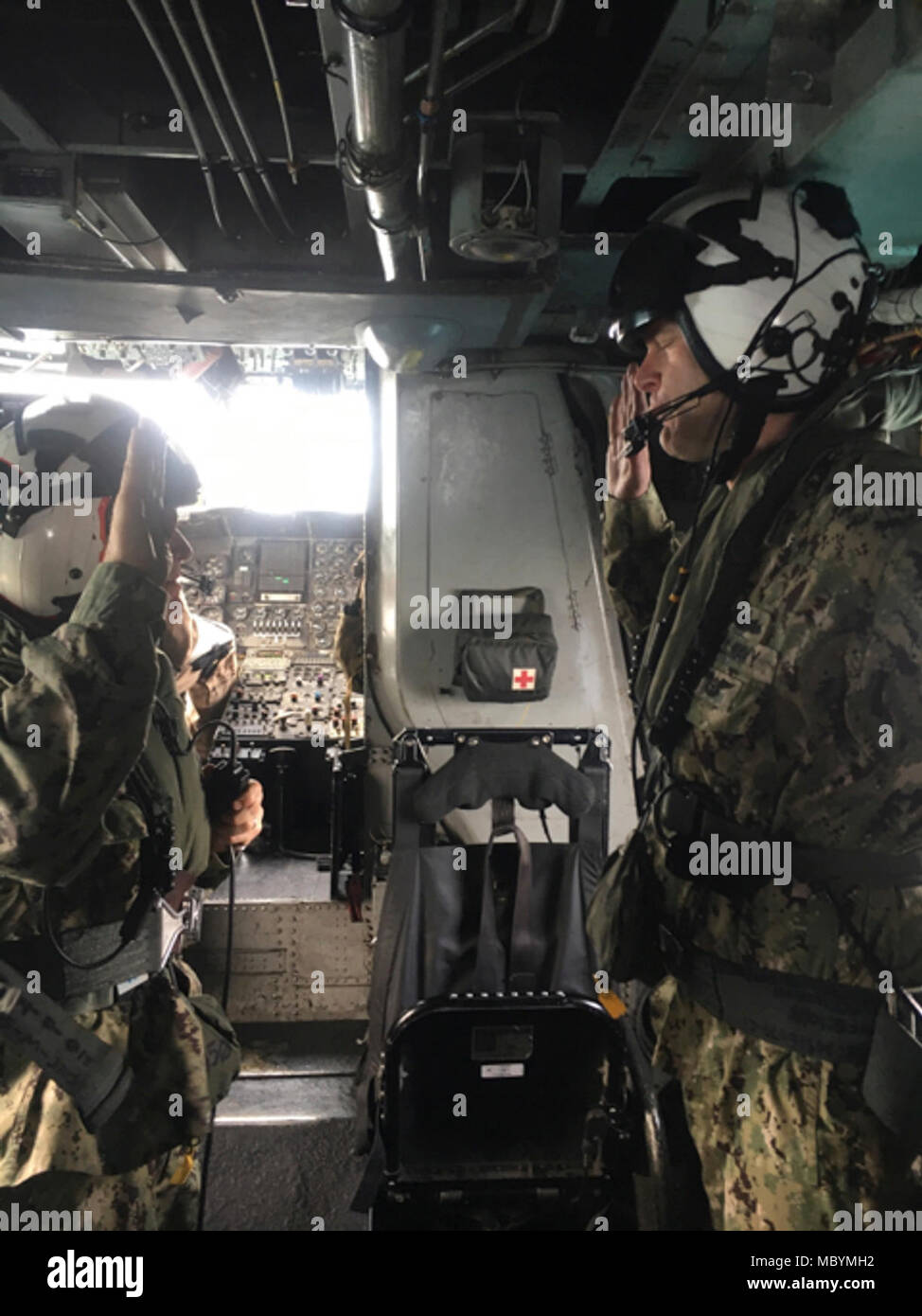 Commander, Task Force (TF) 52, Capt. Mike Eagan (left), reenlists Chief ...
