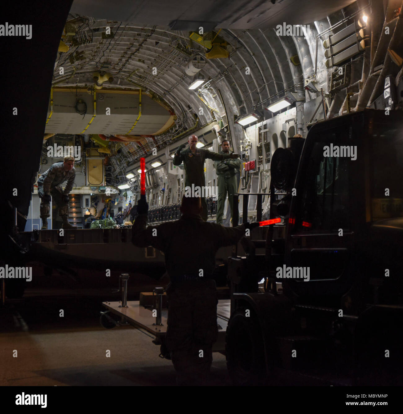 89th Aerial Port Squadron and 3rd Airlift Squadron Airmen begin moving ...