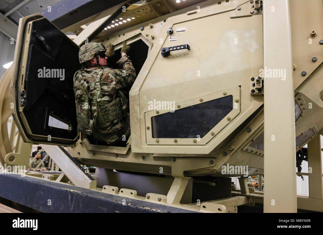 Spc. Ryan Cunningham, an ammunition specialist with the 299th Brigade ...