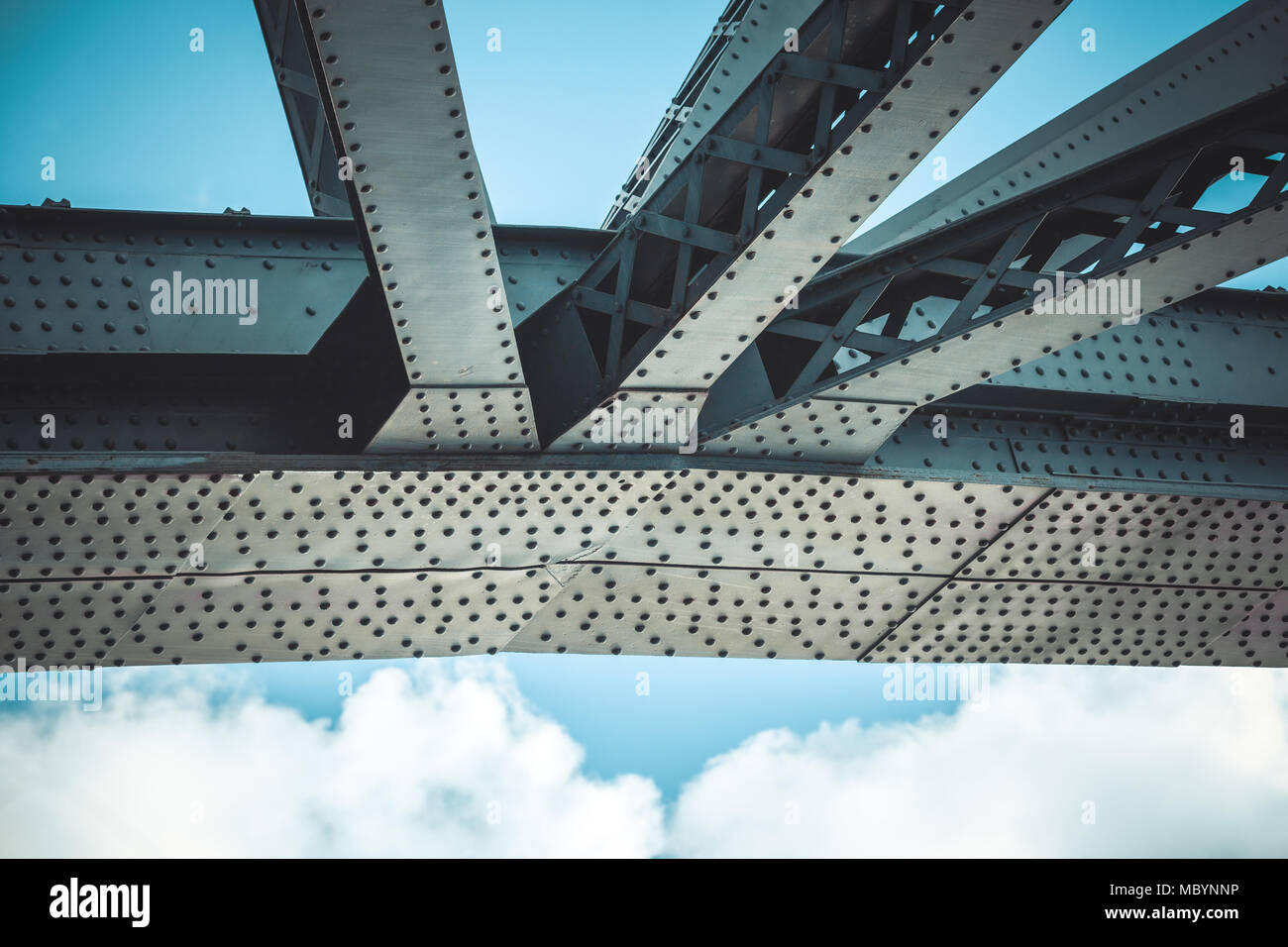 Bridge frame closeup on blue sky background. Horizontal toned image ...