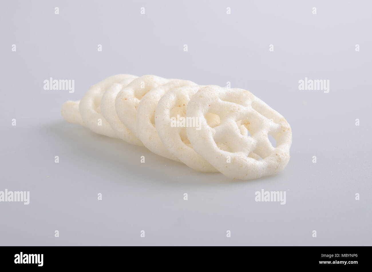 Junk food, potato ring on a background Stock Photo - Alamy