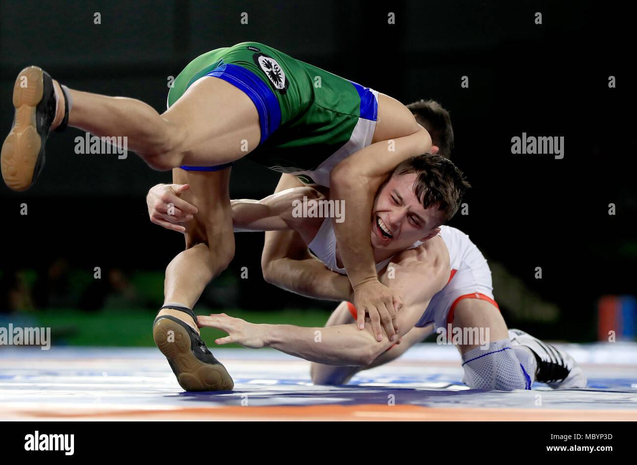Pakistan's Muhammad Bilal in action against England's George Ramm ...
