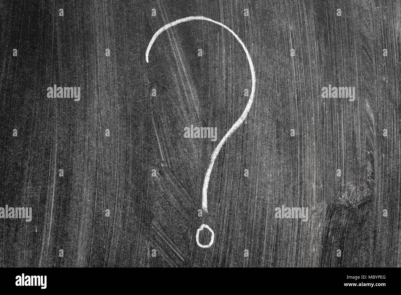 Question mark handwritten with a white chalk on on a blackboard Stock ...