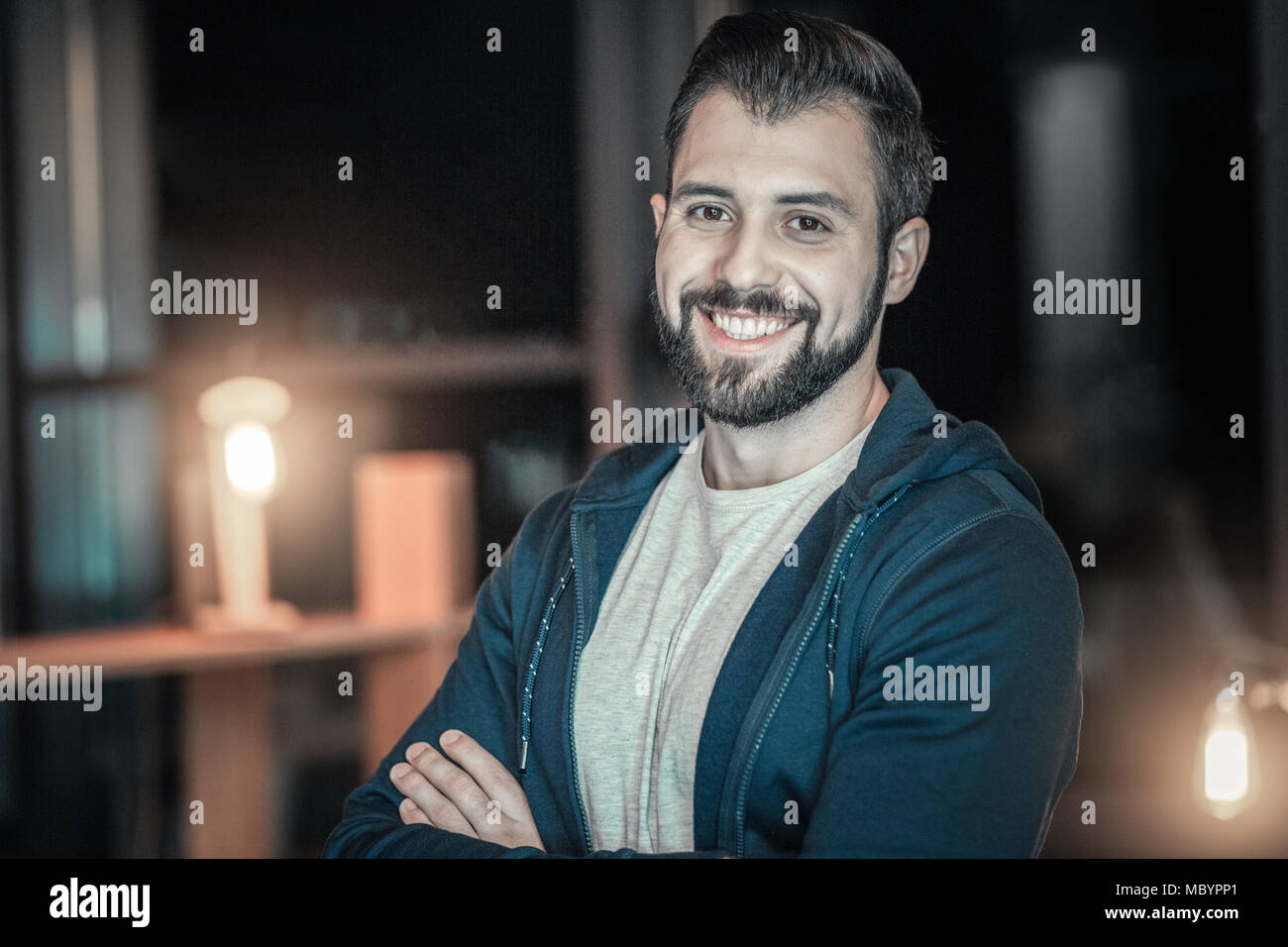 Handsome happy man satisfied with results Stock Photo - Alamy