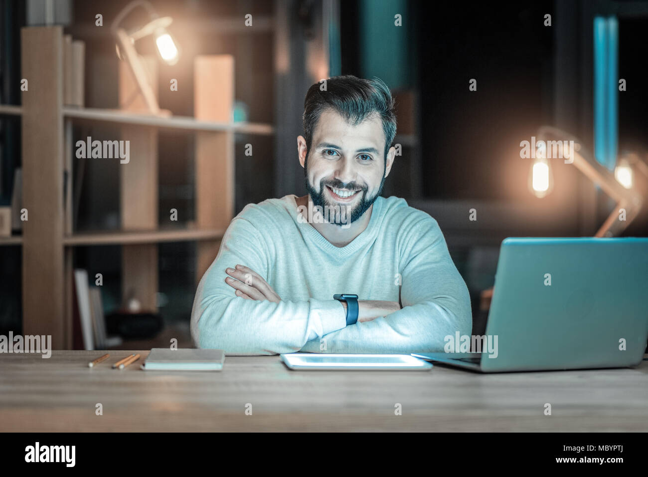 Happy IT guy competing code Stock Photo - Alamy