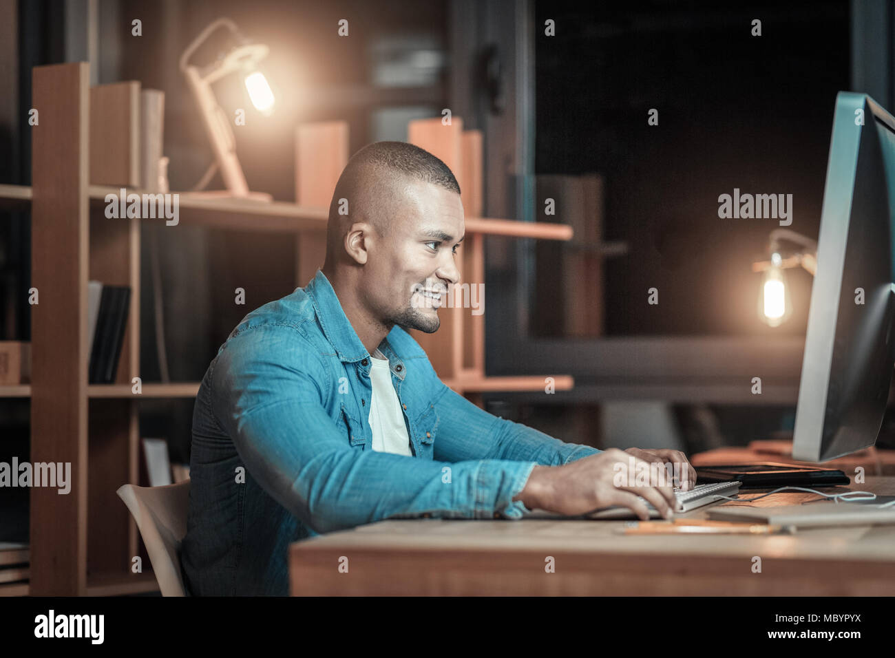 Happy IT guy sharing data Stock Photo - Alamy