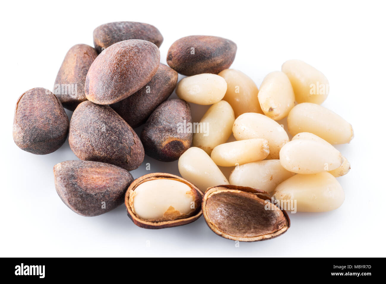 Pine nuts on the white background. Organic food Stock Photo - Alamy