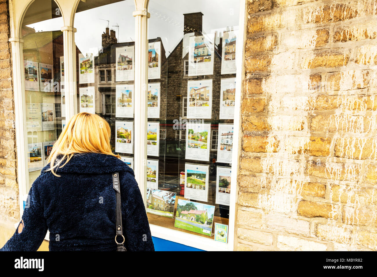 Looking in Estate Agent window, Looking in Estate Agents window ...