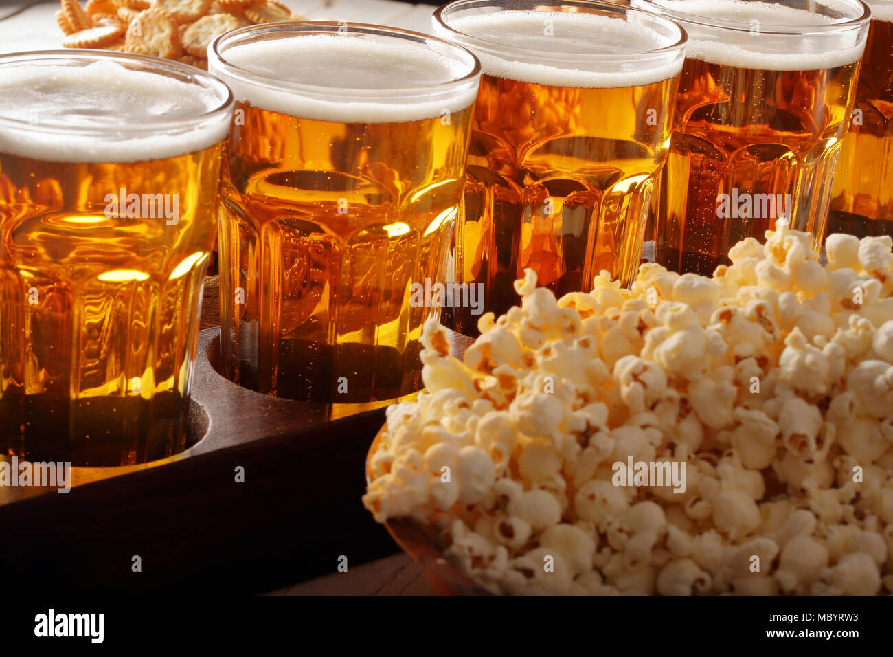 Lager beer and snacks on wooden table with copy space Stock Photo - Alamy
