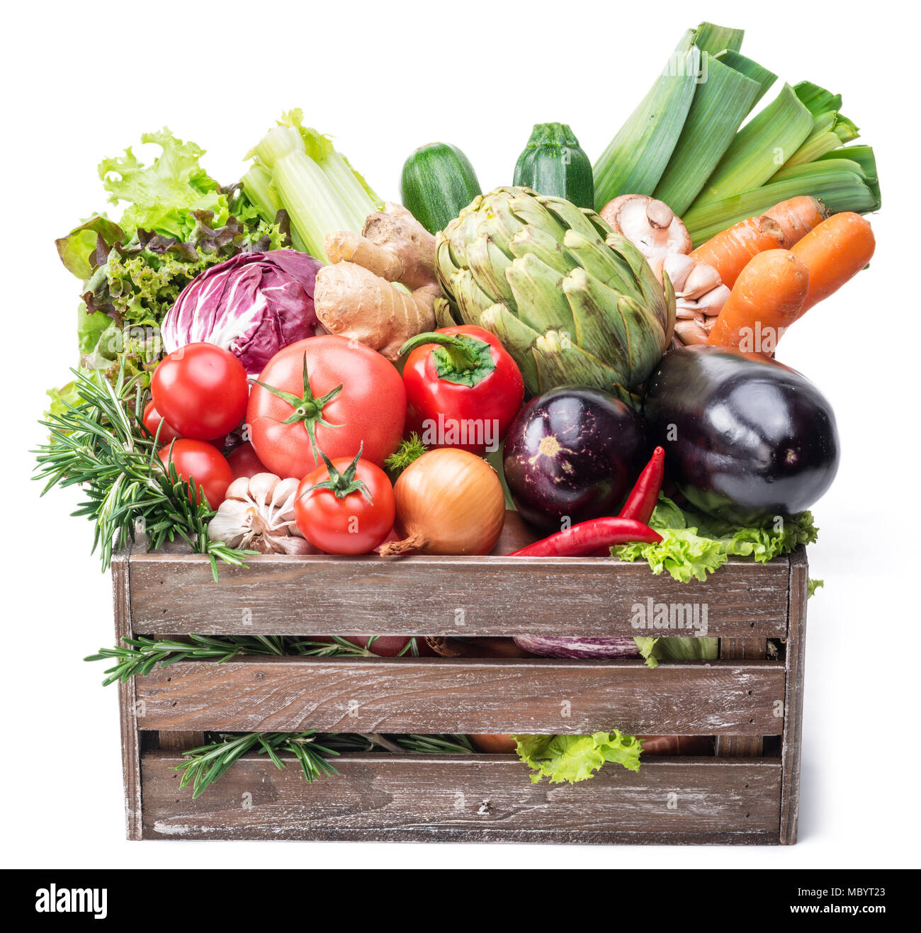 Fresh multi-colored vegetables in wooden crate Stock Photo - Alamy