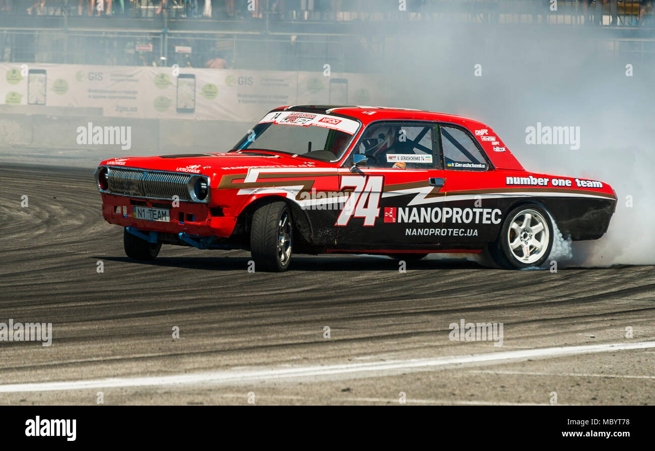 Lviv, Ukraine - June 10, 2017: Unknown rider on the car brand GAZ - 24 ...
