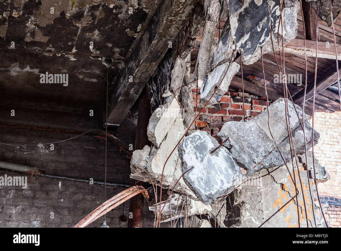 Collapsed broken roof at abandoned building Stock Photo - Alamy