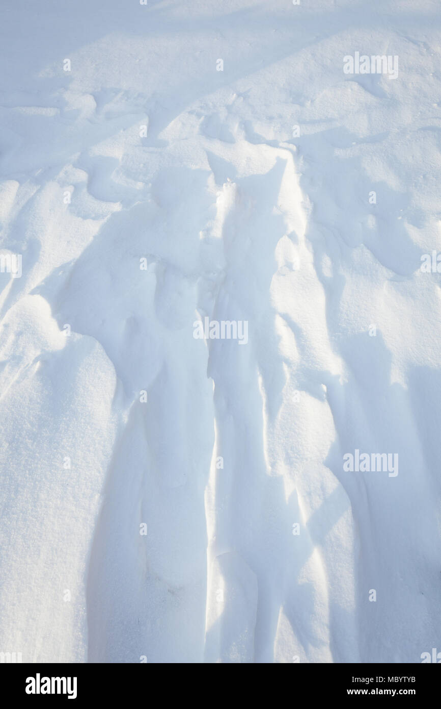 Wind patterns in snow Stock Photo - Alamy