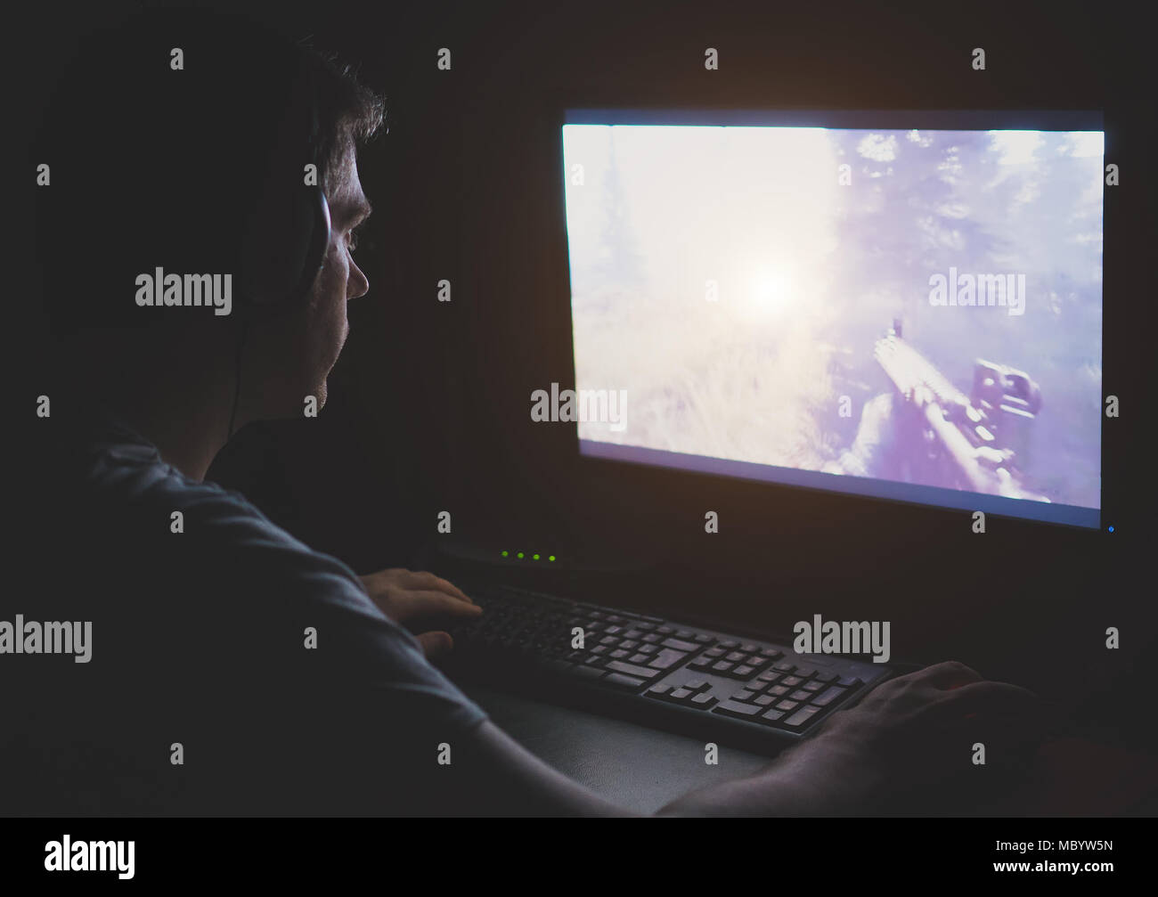 Man computer rear view night hi-res stock photography and images - Alamy