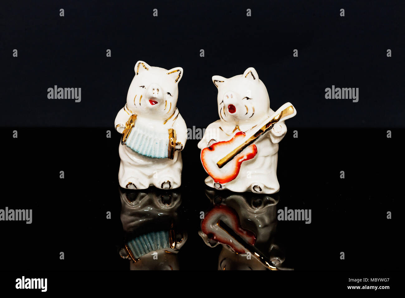 ceramic pigs playing instruments salt and pepper shaker set Stock Photo ...