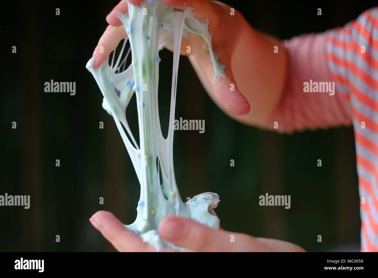 Child with home made slime. The new craze uses borax and PVA glue and ...