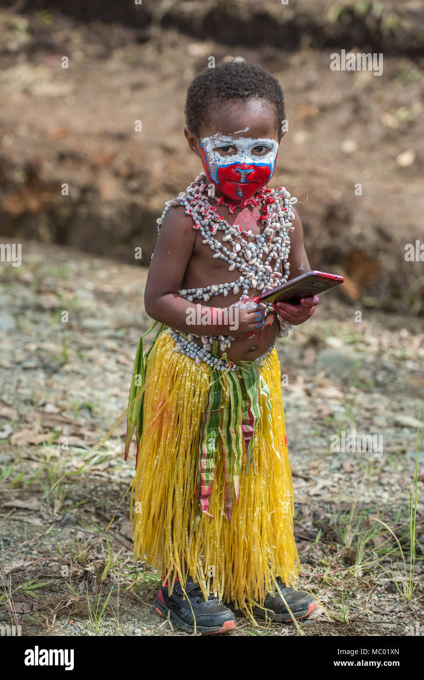 Papua new guinea tribal costume child hi-res stock photography and ...