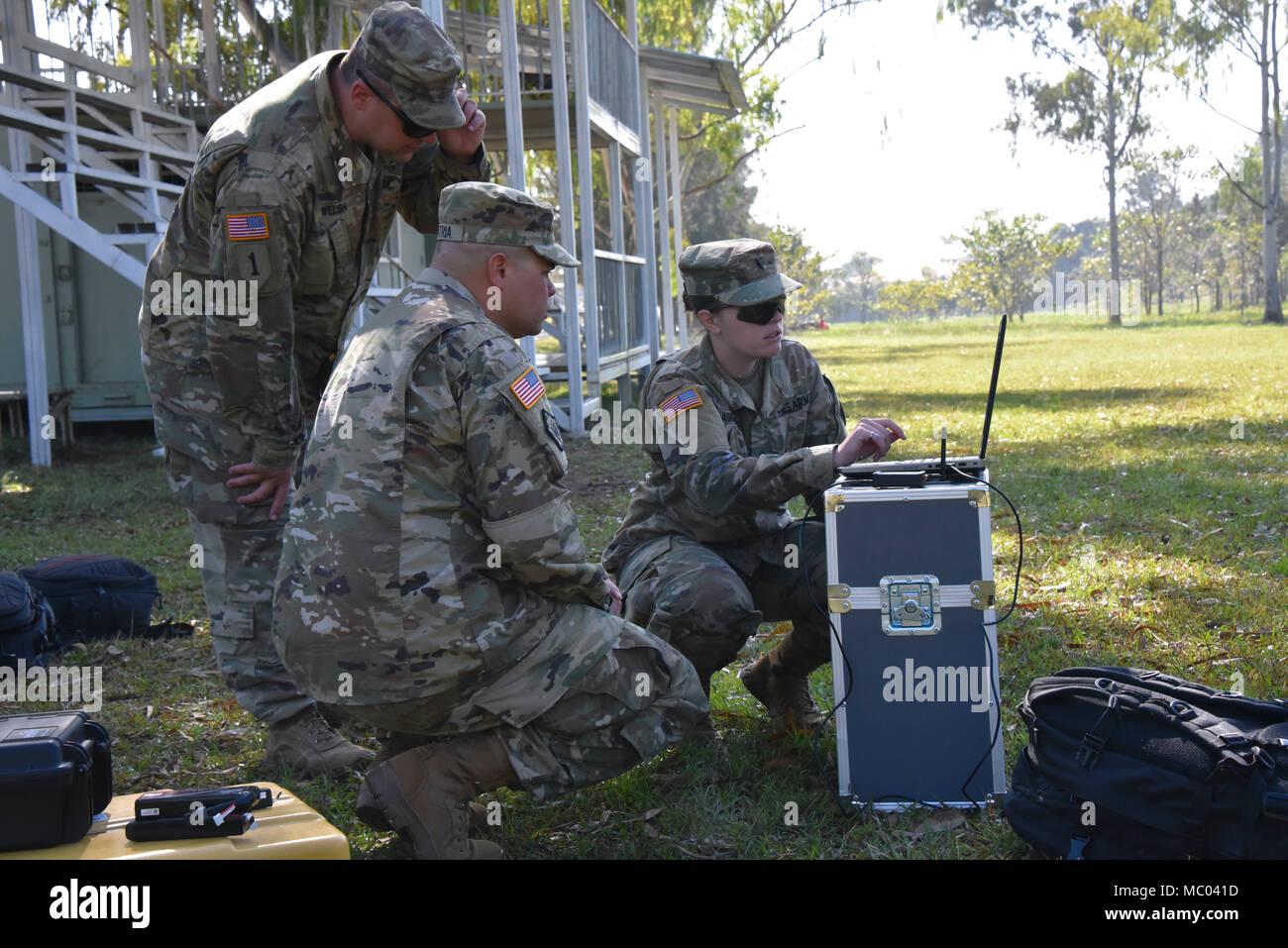 U.S. Army engineers with Joint Task Force-Bravo monitor the associated ...