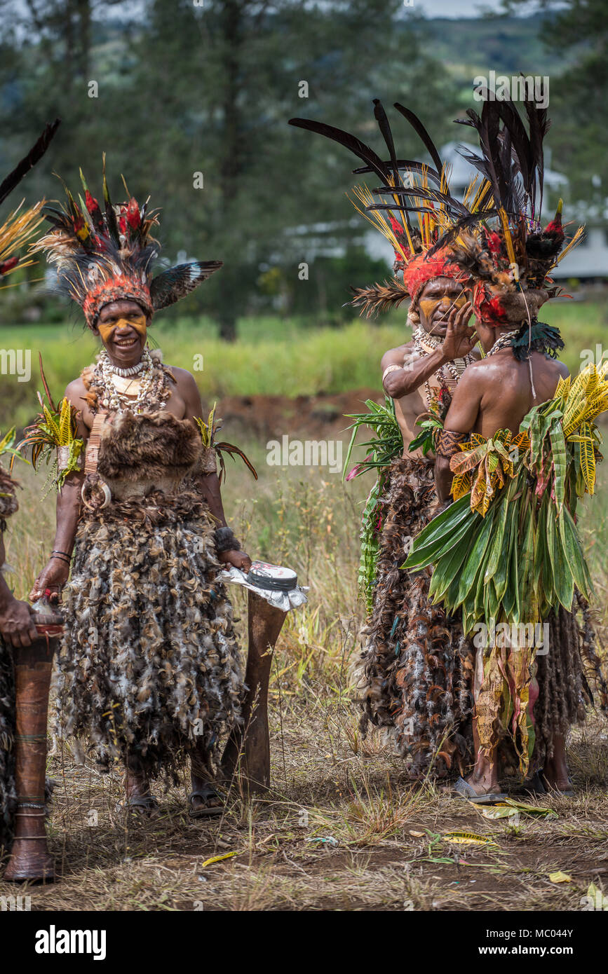 A group of women in in traditional costume prepaing for the show, Mount ...